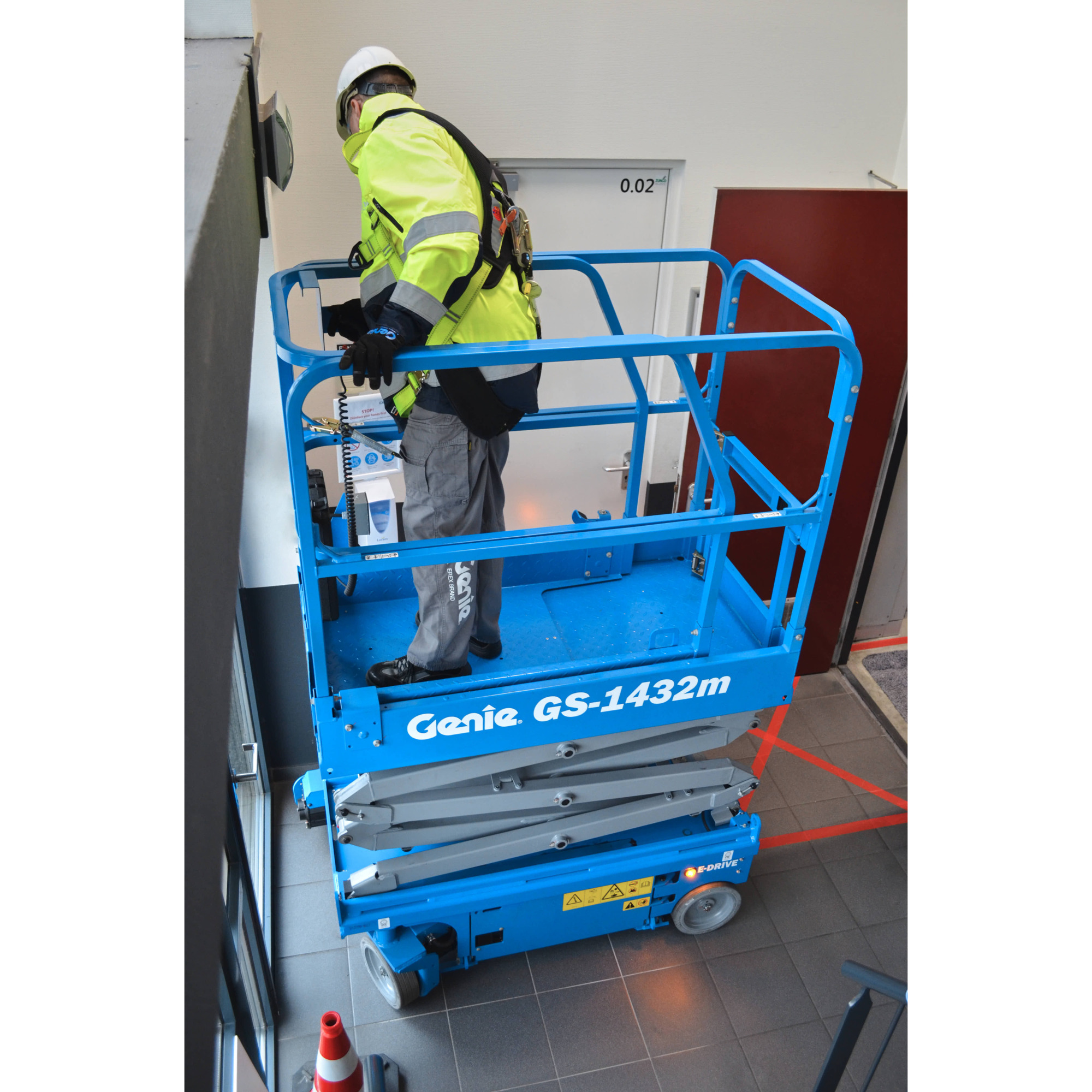 Genie® GS™-1432m E-Drive scissor lift is equipped with an efficient ...
